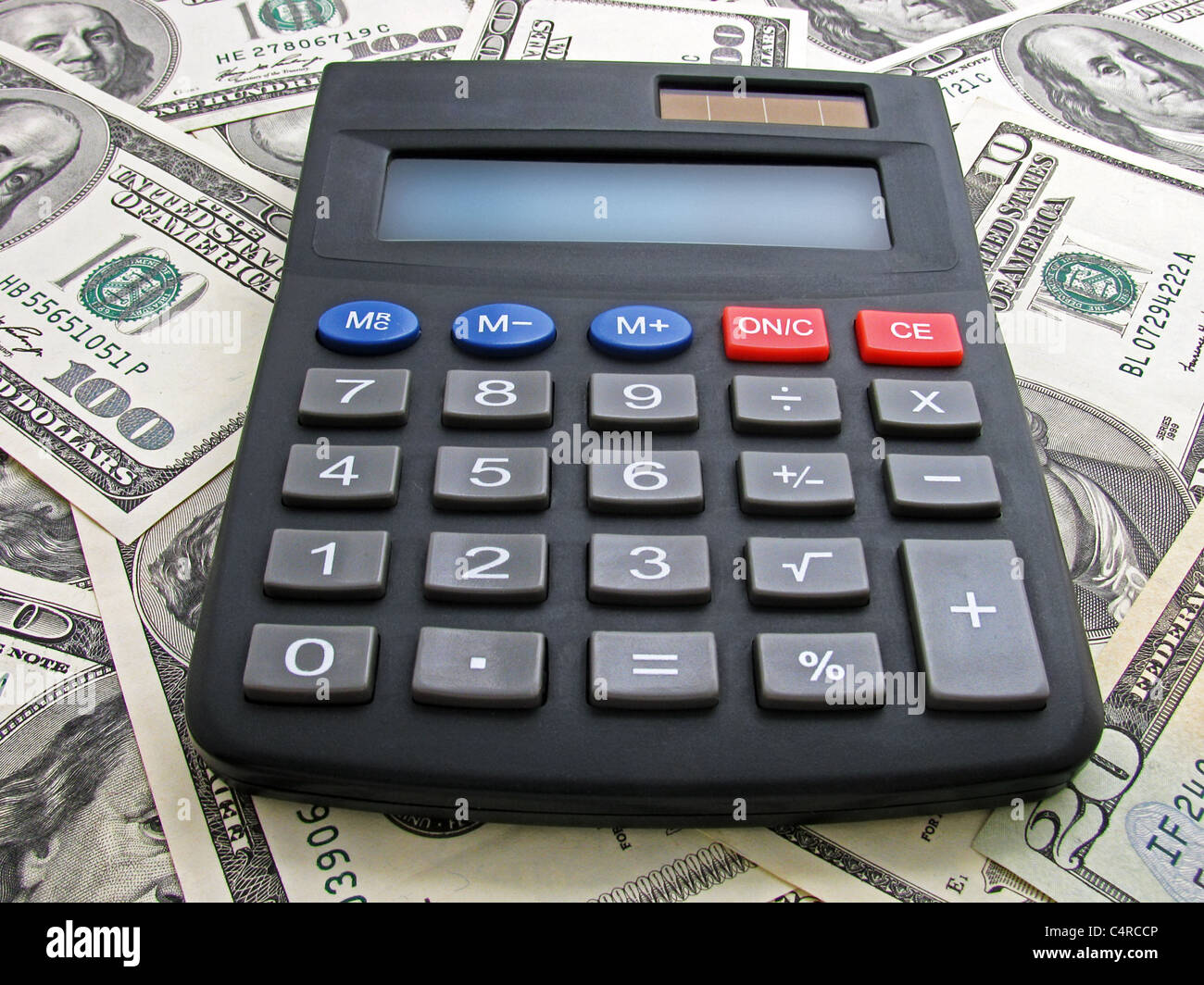 Calculator 100 dollars accounting hi-res stock photography and images ...