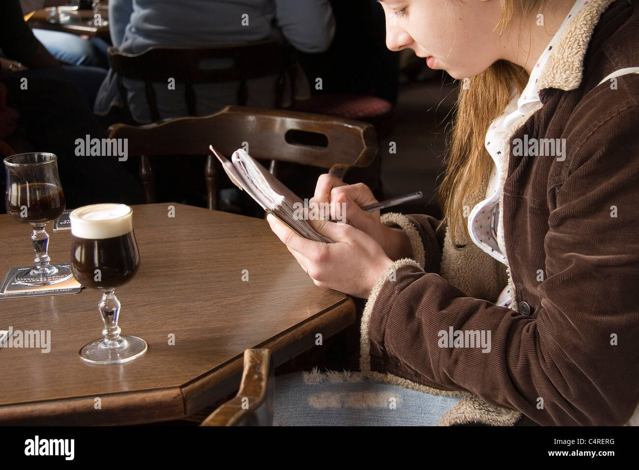 Enjoying an Irish coffee in a traditional Irish pub, Doolough Valley ...