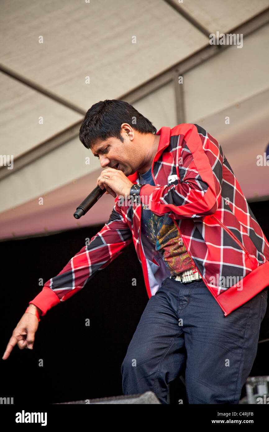Manak-E, a Punjabi Bhangra singer based in England, performing on stage ...
