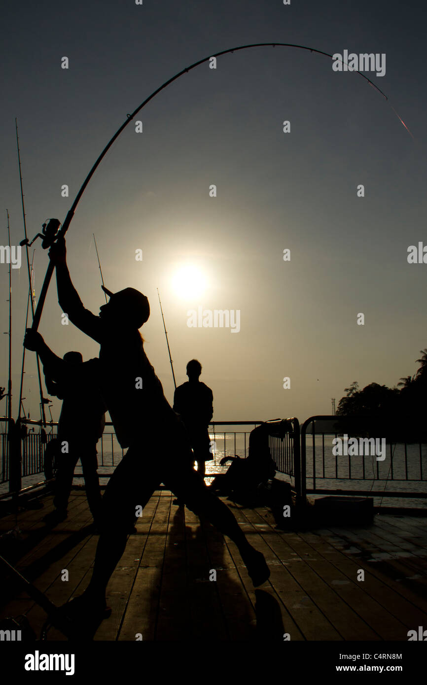 Anglers at the jetty hi-res stock photography and images - Alamy