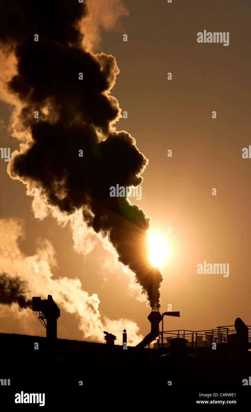 sun covered with smoke - air pollution Stock Photo - Alamy