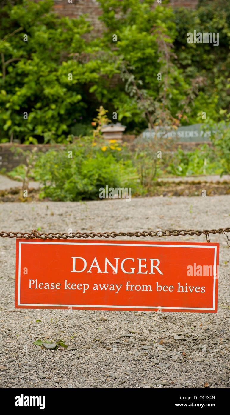 Danger warning sign in Mirehouse garden. Please keep away from bee ...