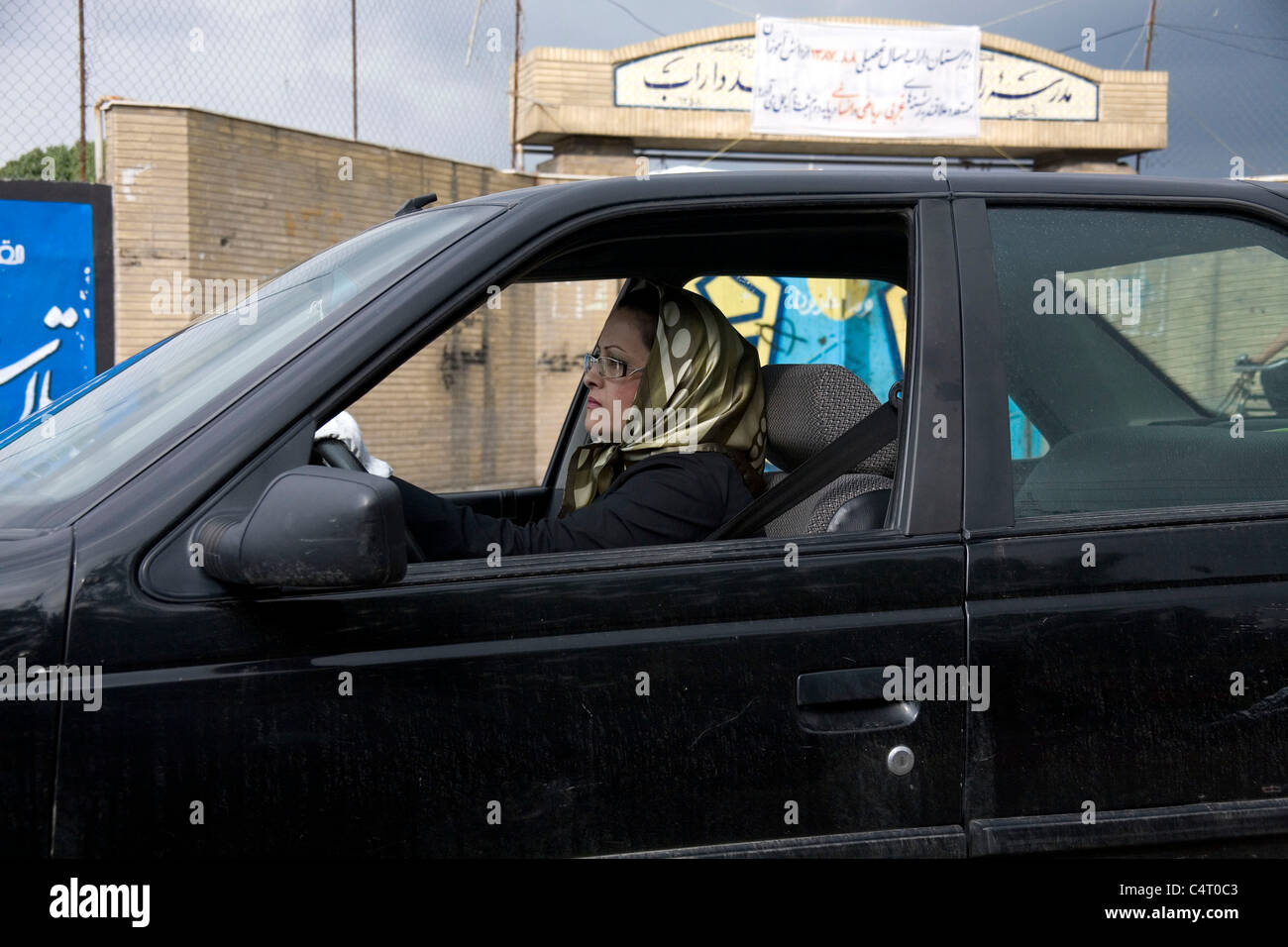 Iran woman driving hi-res stock photography and images - Alamy