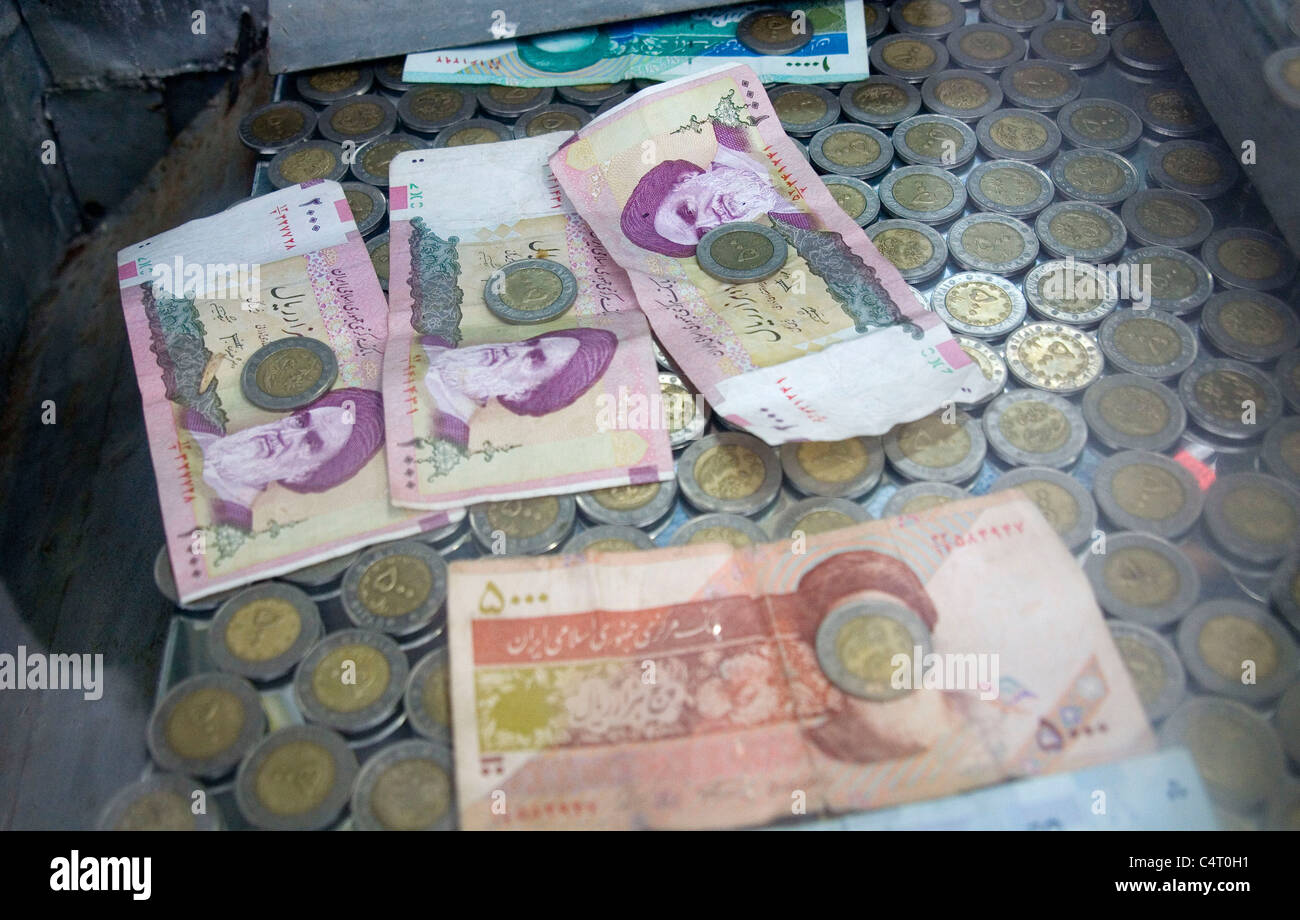 Banknotes and coins in Gorgan, Iran Stock Photo - Alamy