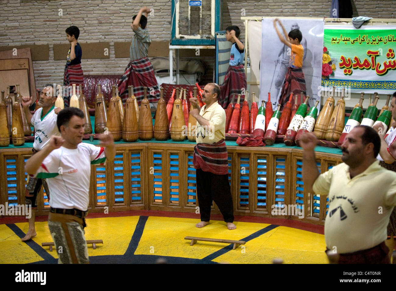 Man and boy in Yazd practising zurkhaneh (traditional Iranian dance ...