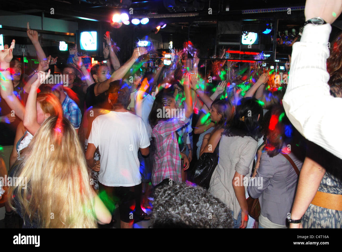 teenage boys and girls at a Spanish disco Stock Photo - Alamy