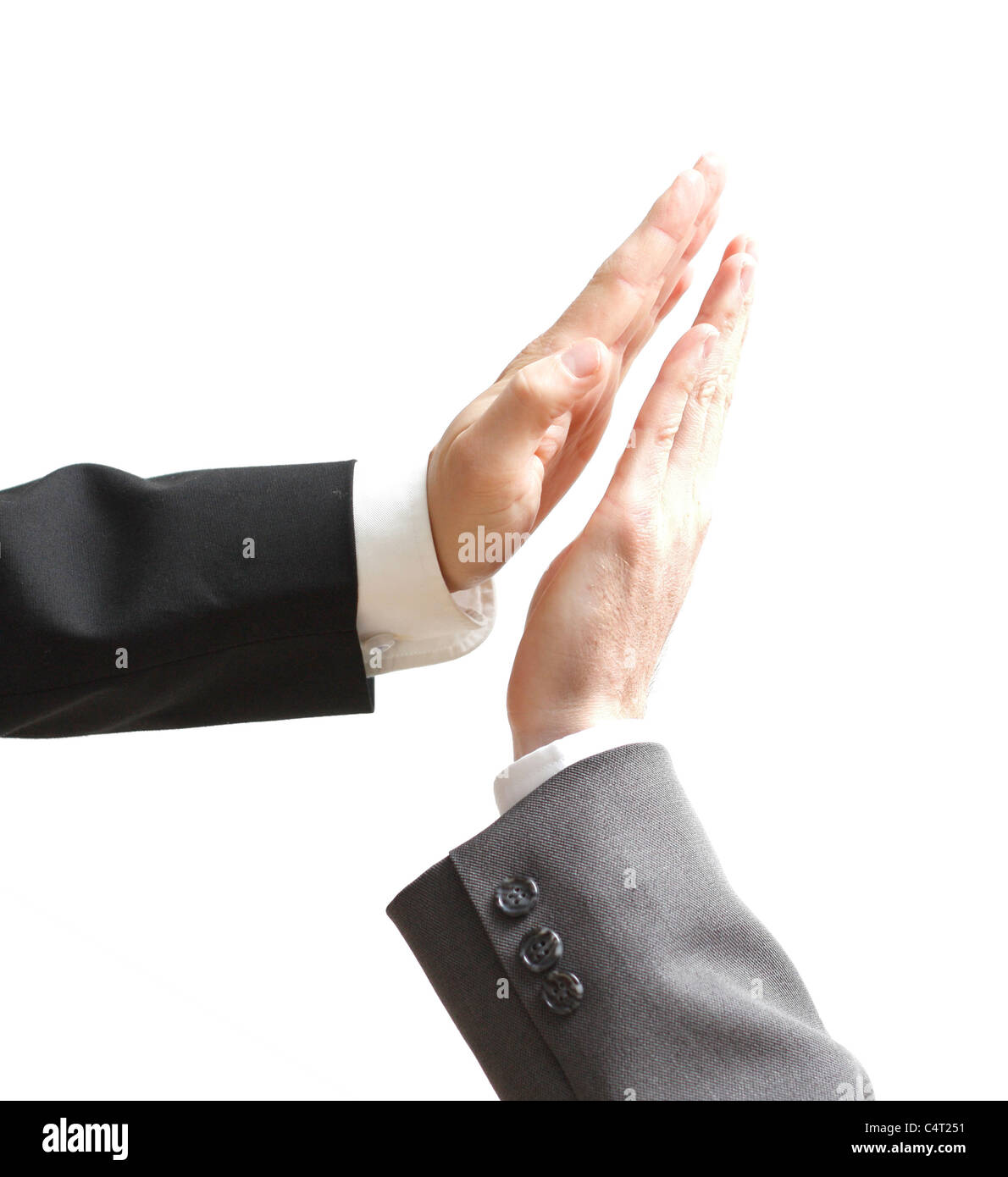 Business men doing a high five Stock Photo - Alamy