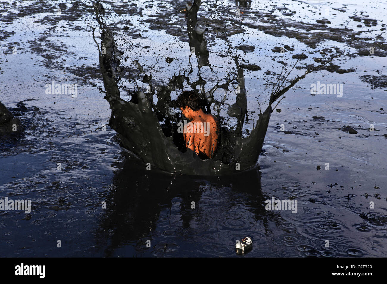Bloco da Lama in Paraty Brazil Carnival Youth clad in swim wear and ...