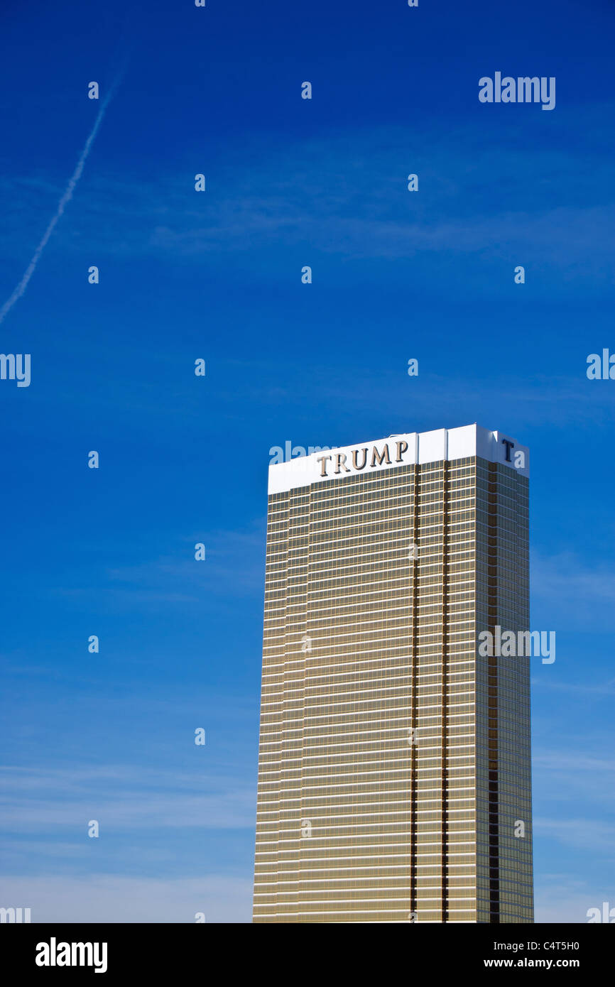 A high rise luxury hotel rising into a blue sky Stock Photo - Alamy