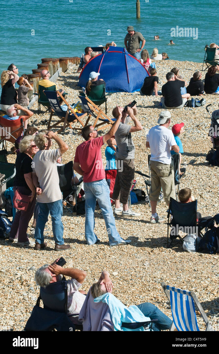 People Looking Up At The Sky