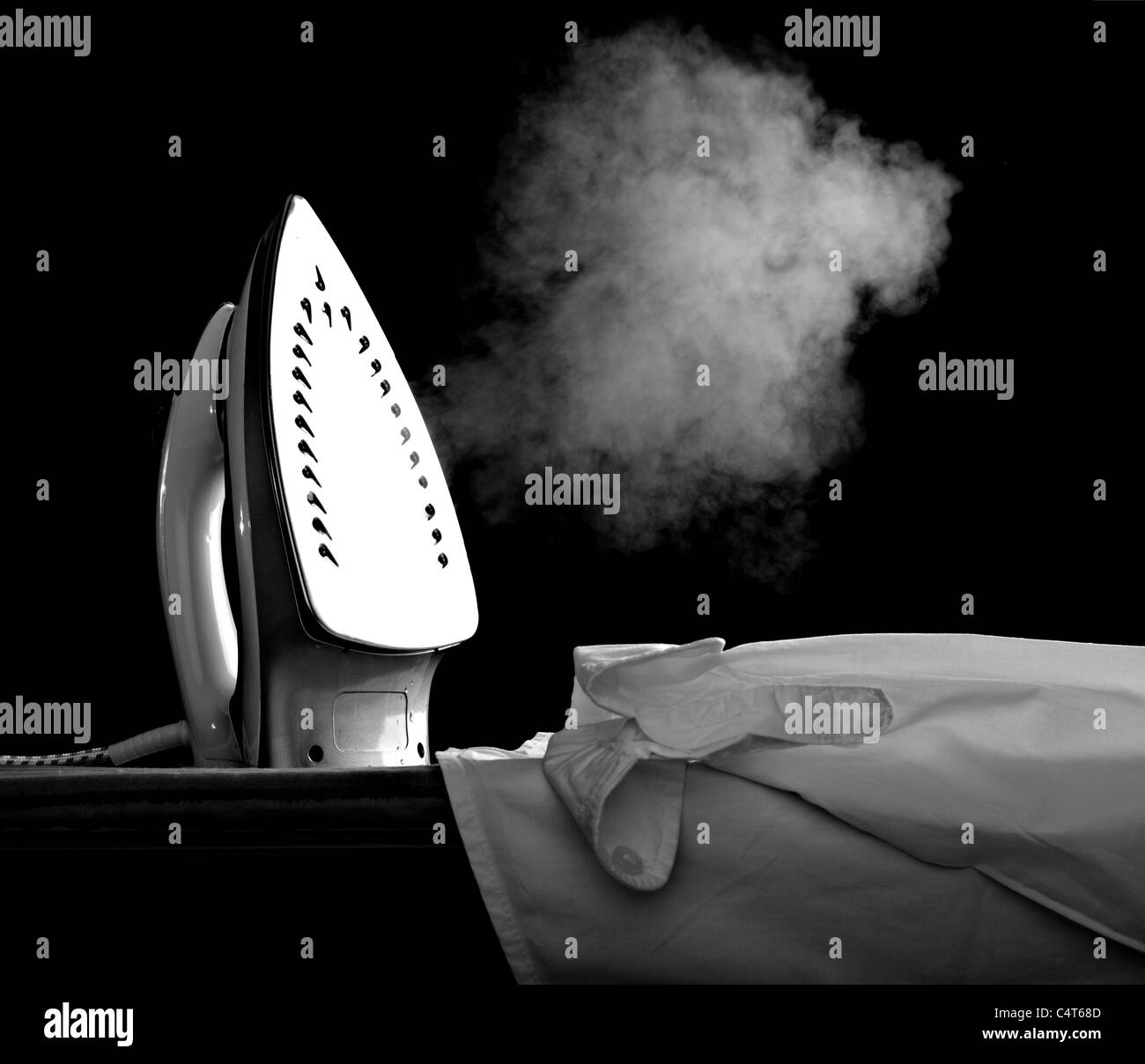 Ironing clothes Black and White Stock Photos & Images - Alamy