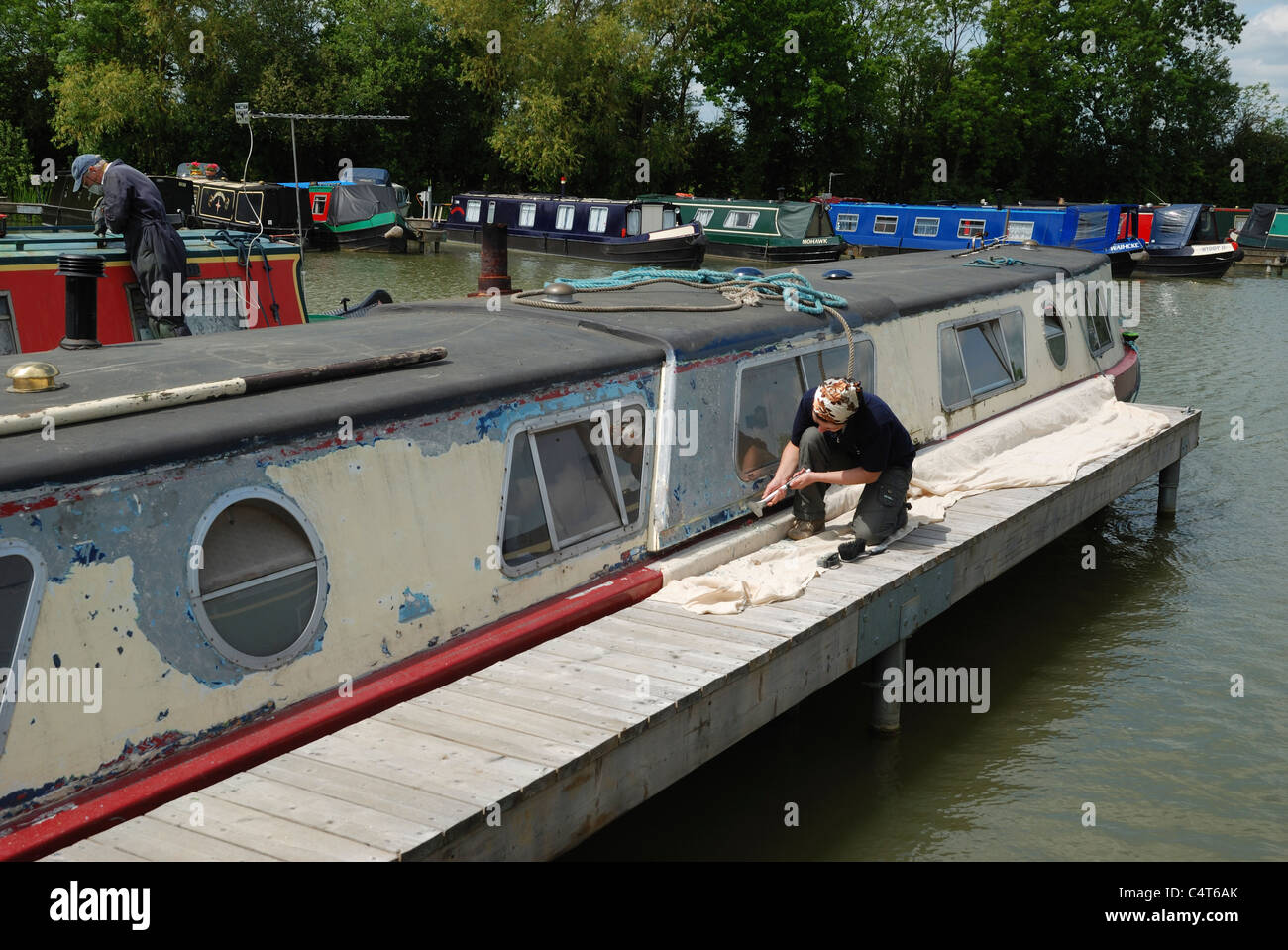 Traditional English narrow boats being restored at Gayton Marina ...
