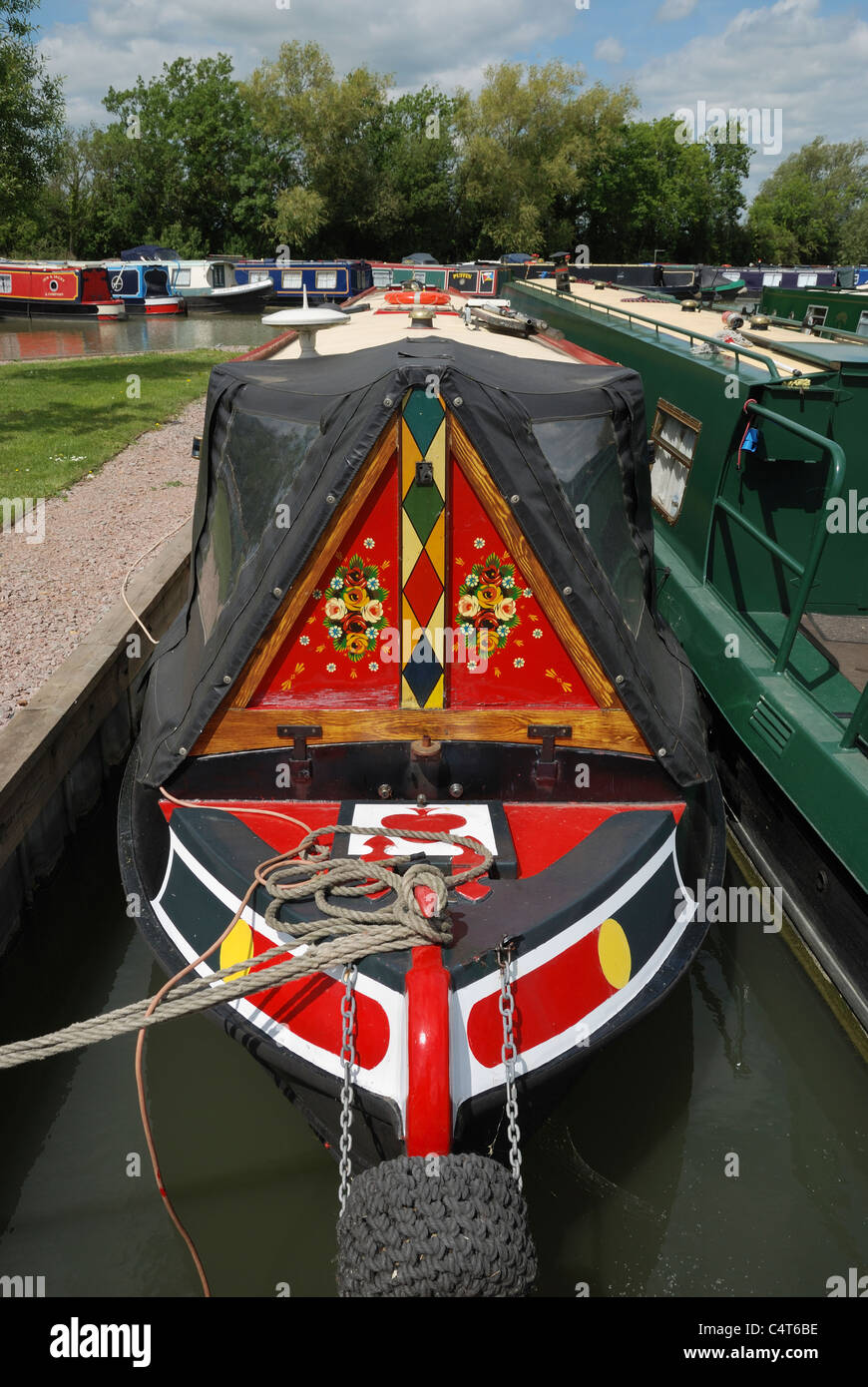 A traditional English narrow boat moored at Gayton Marina ...
