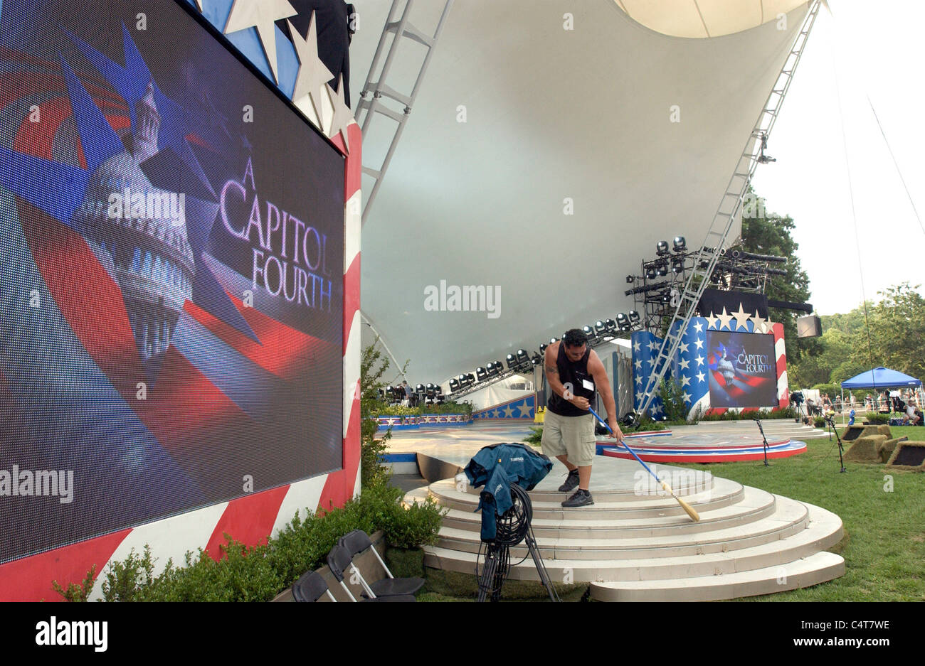 A worker prepares the stage before the dress rehearsal for the Capitol ...