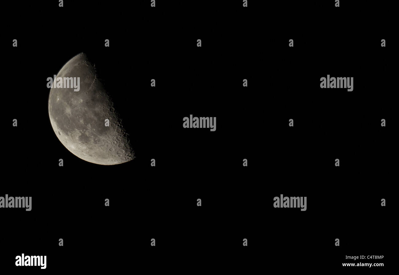 Telescope image of half crescent moon Stock Photo - Alamy