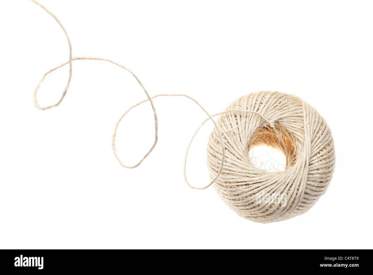 String of hemp isolated on white background Stock Photo - Alamy