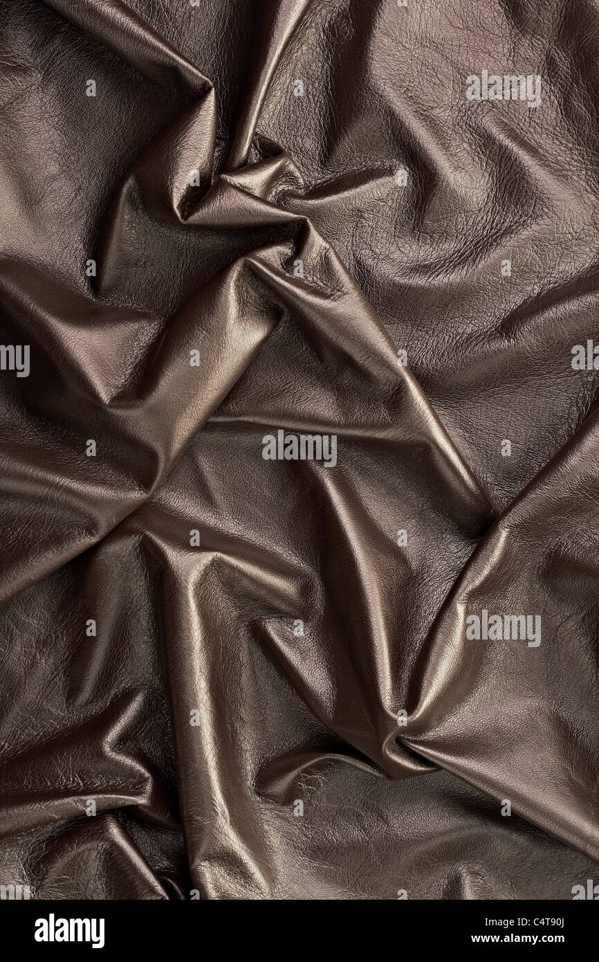 natural shiny brown folded leather vertical background Stock Photo - Alamy