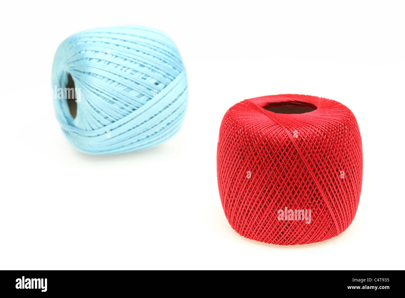 Red thread isolated on white background Stock Photo - Alamy