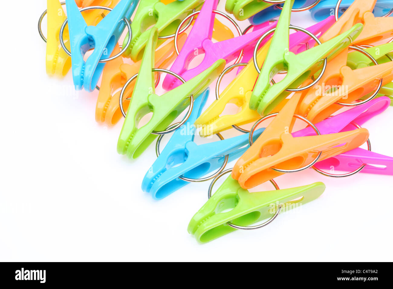 Colorful clothespins isolated on white background Stock Photo - Alamy