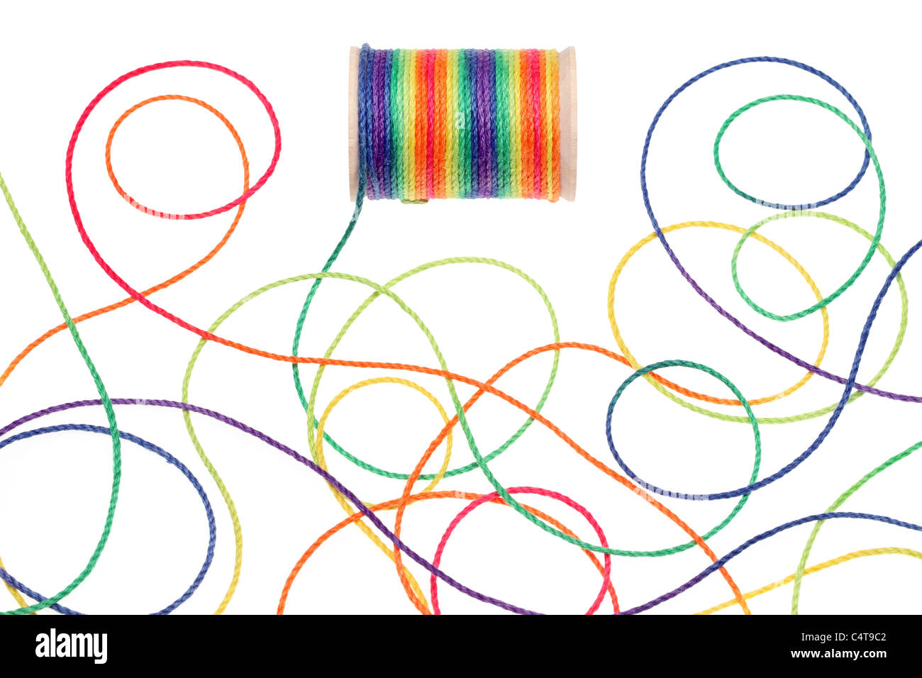 Colorful thread isolated on white background Stock Photo - Alamy
