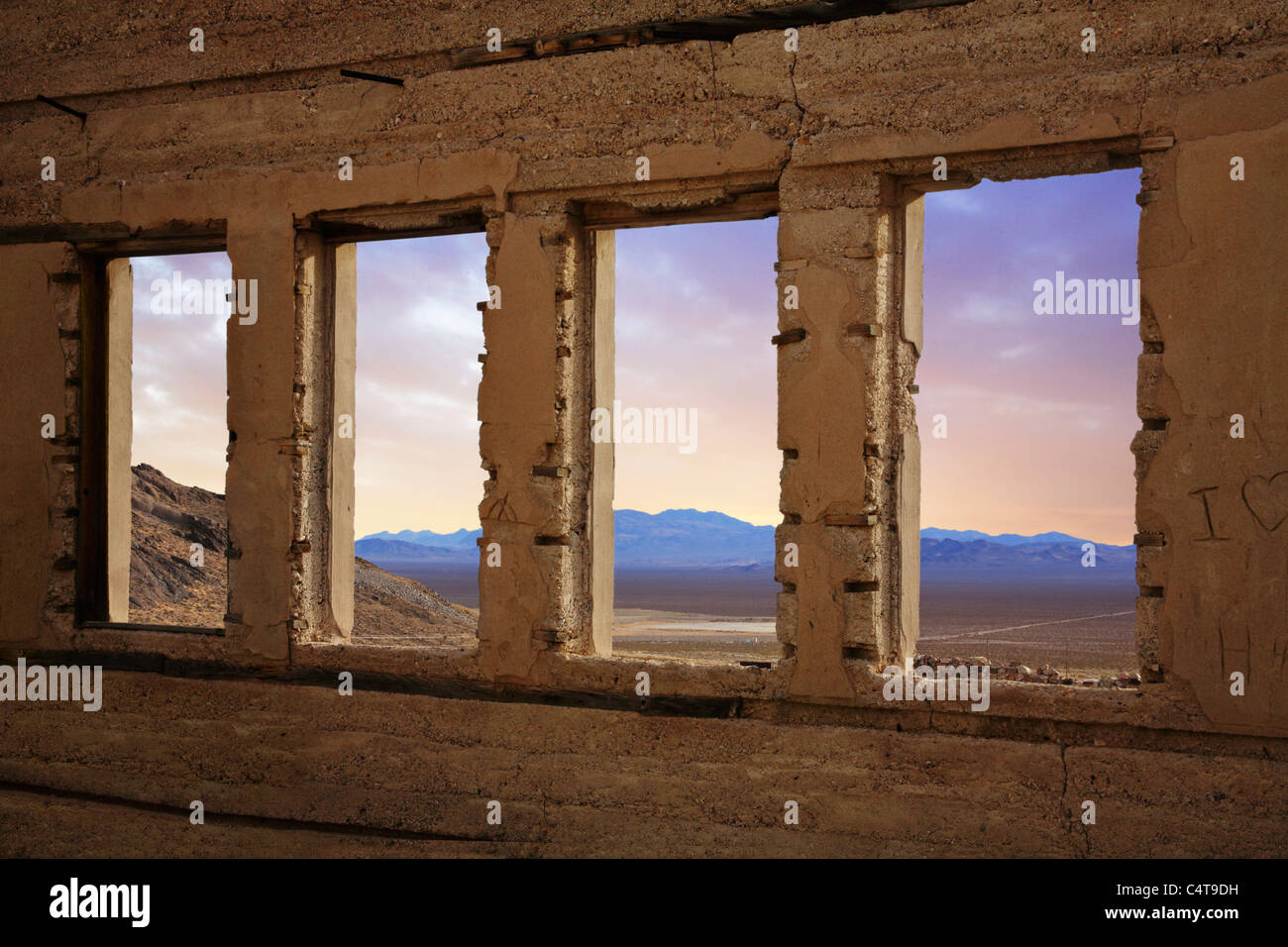 Looking Through The Windows Of A Crumbling Structure Overlooking The ...