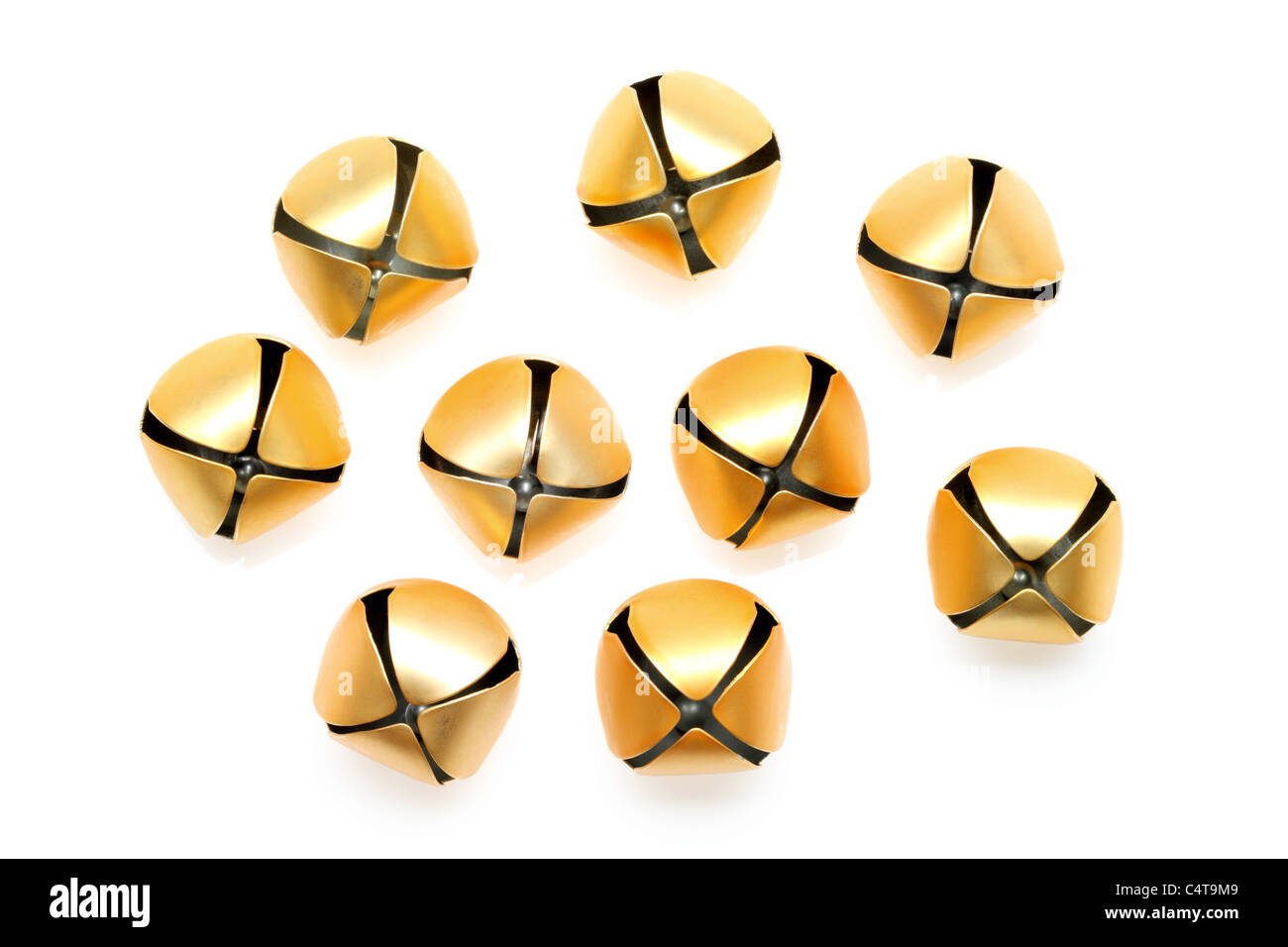 Golden bells isolated on white background Stock Photo - Alamy