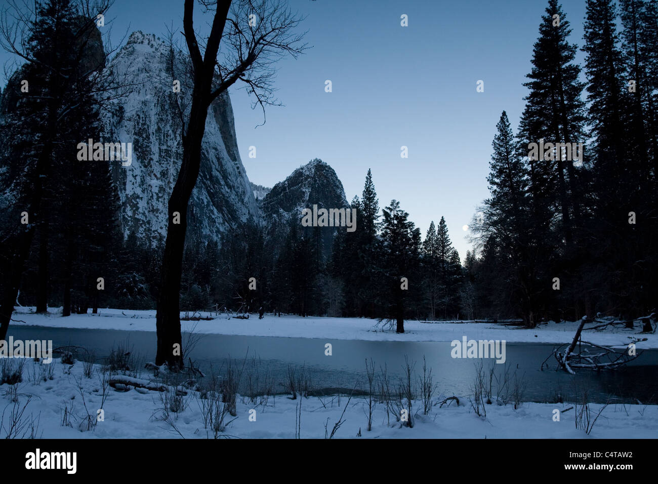 Cathedral Rocks after a snowfall in Yosemite, early dawn Stock Photo ...