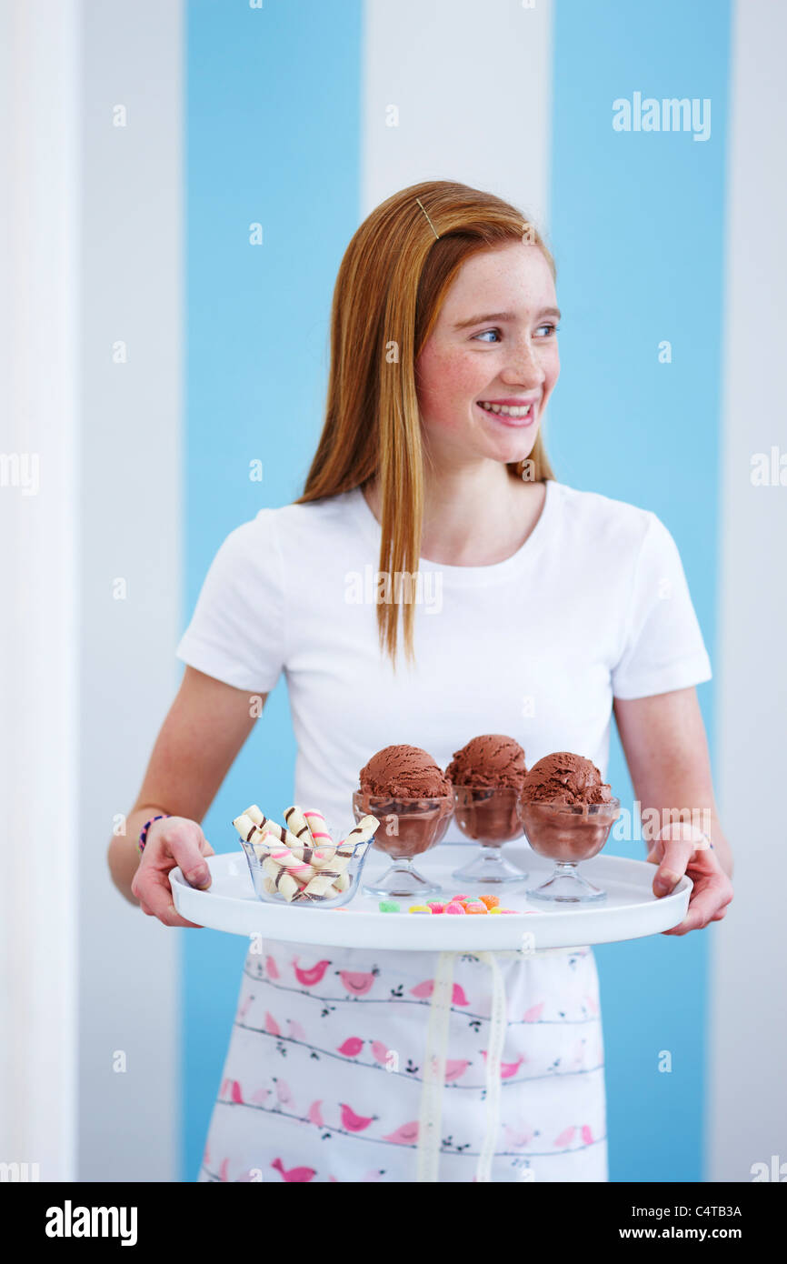 Girl Serving Ice Cream Stock Photo - Alamy
