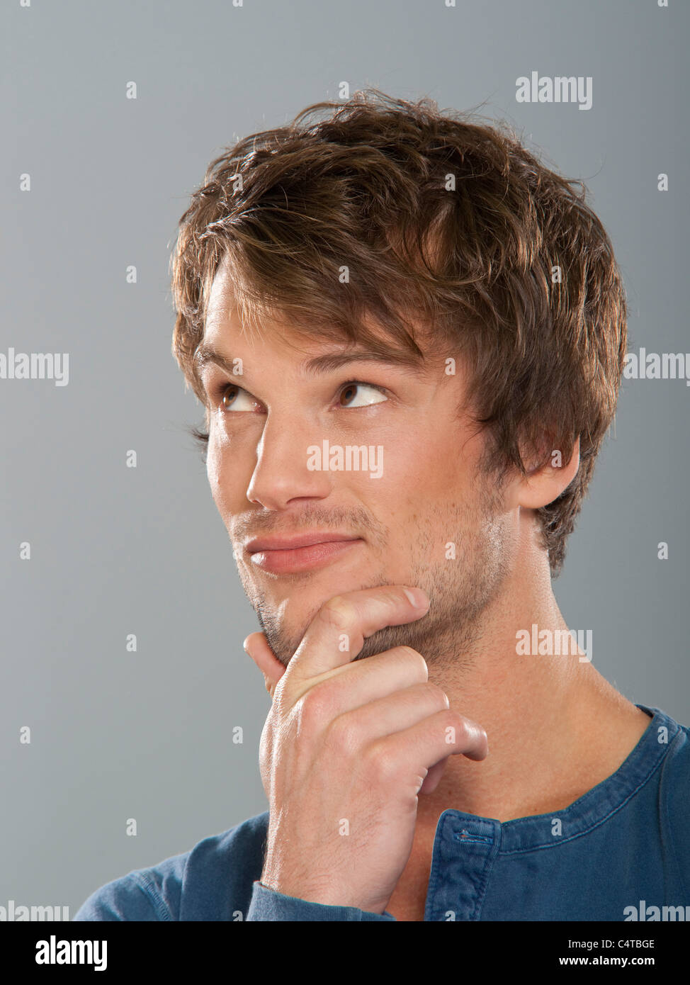 Brooding studio portrait in colour hi-res stock photography and images ...