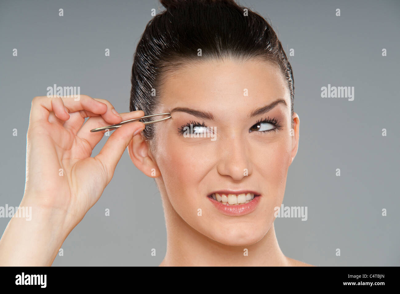 Old woman plucking hi-res stock photography and images - Alamy