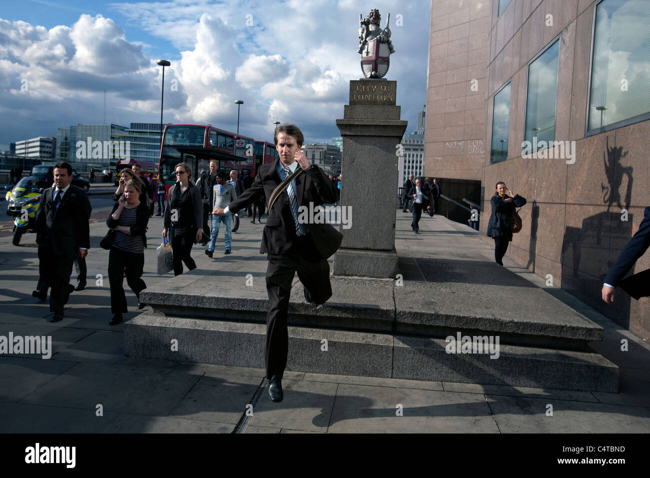 man runs near london bridge station Stock Photo - Alamy
