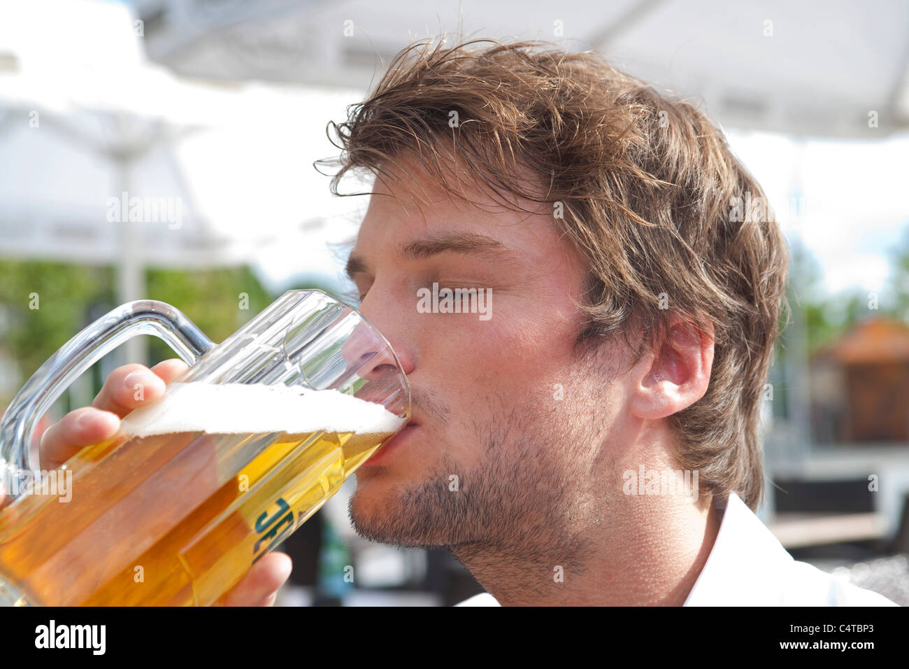 Guzzling beer hi-res stock photography and images - Alamy