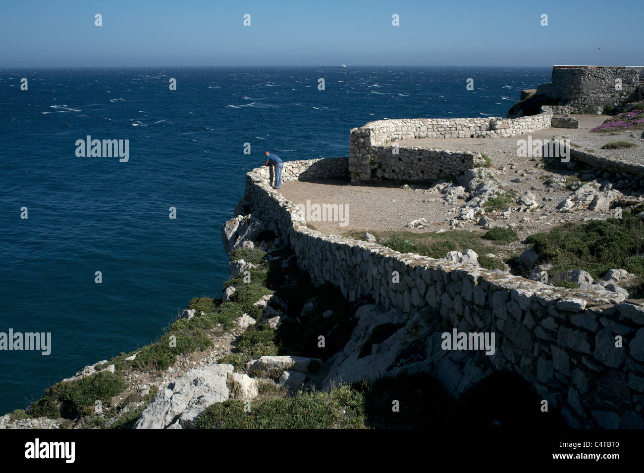 Man looking at the sea Europa point Gibraltar Stock Photo - Alamy