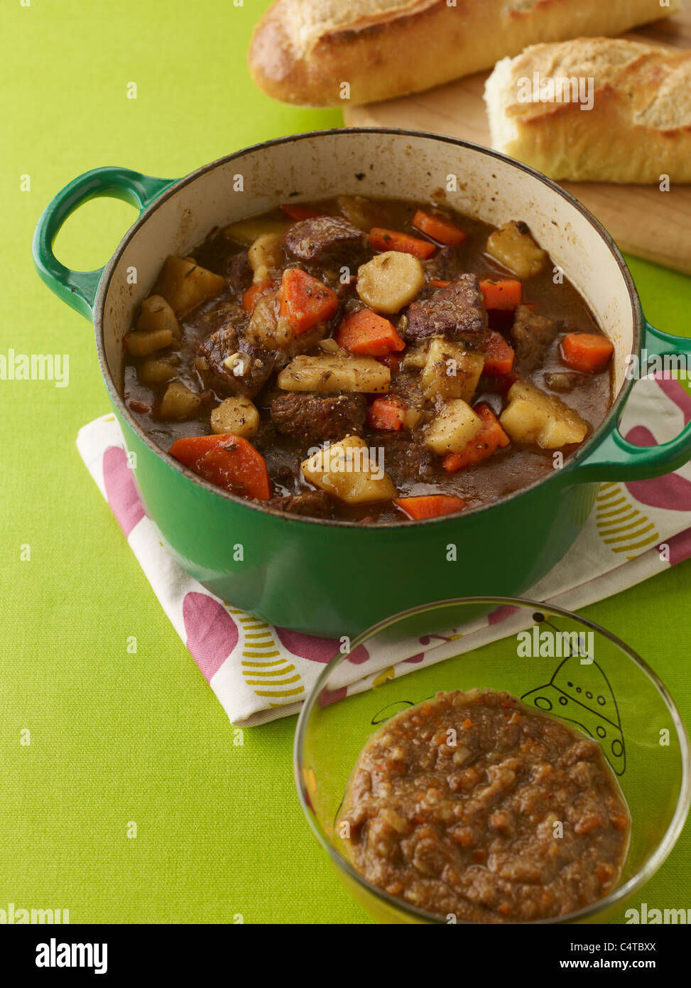 Beef Stew in Pot with Baby Food and Baguette Stock Photo - Alamy