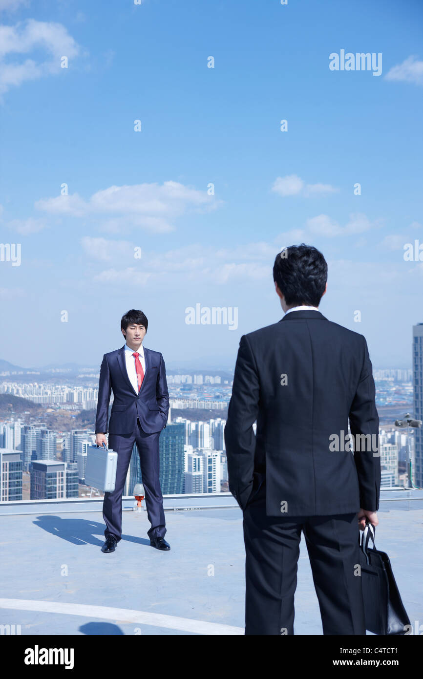 Two rivals facing hi-res stock photography and images - Alamy