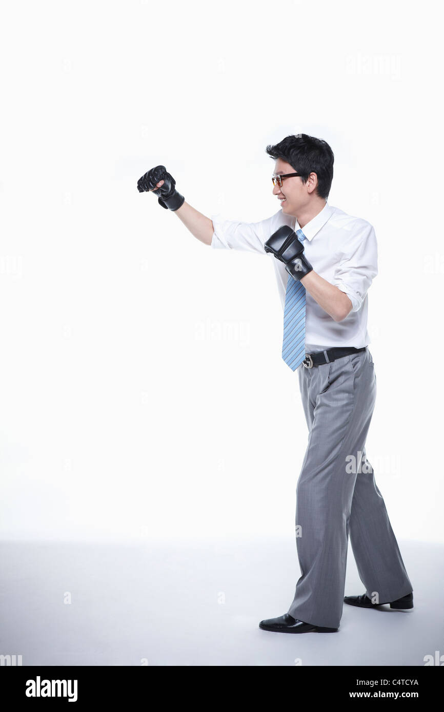business man outstretched his arms wearing gloves Stock Photo - Alamy