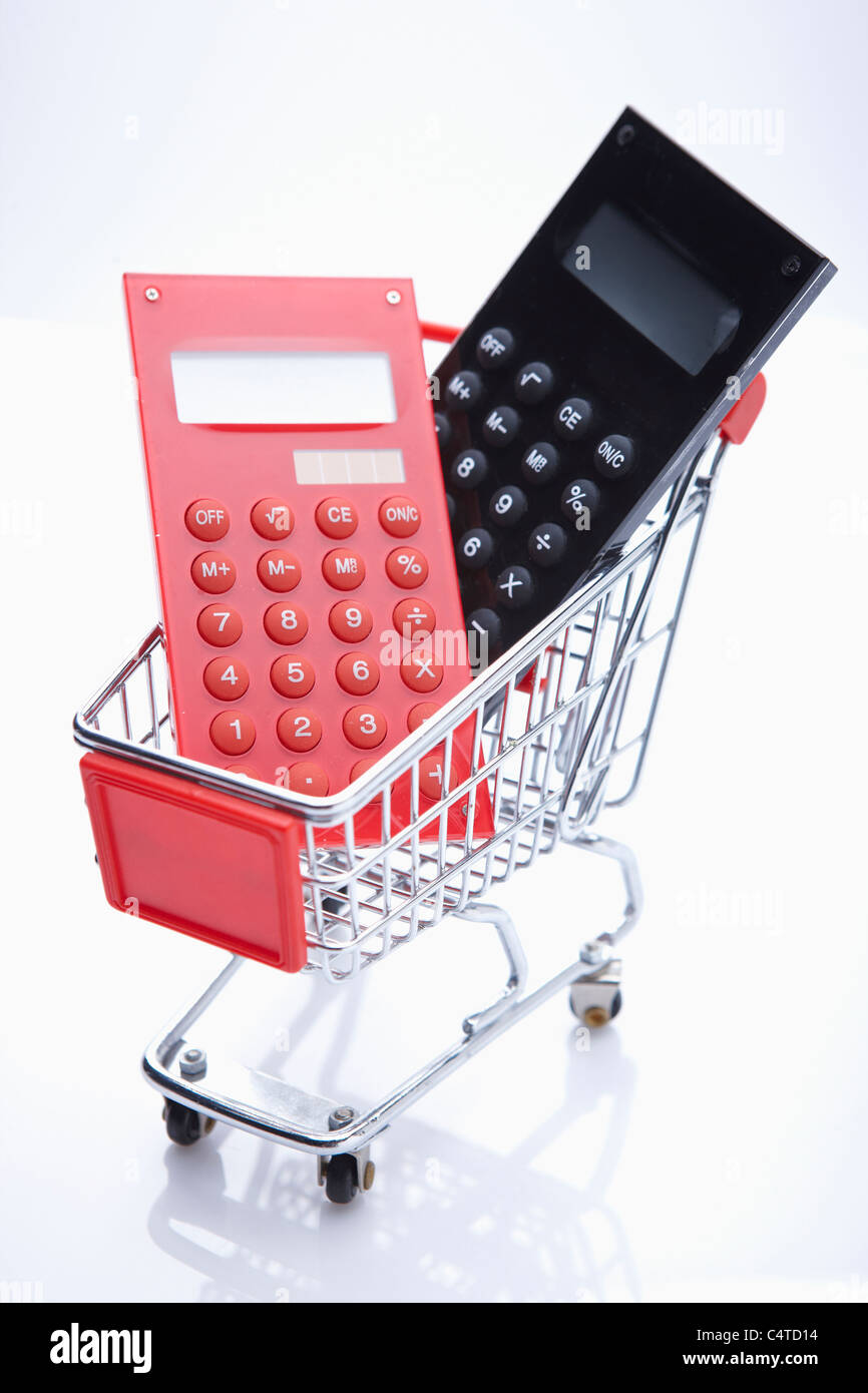 calculators in the shopping cart Stock Photo - Alamy