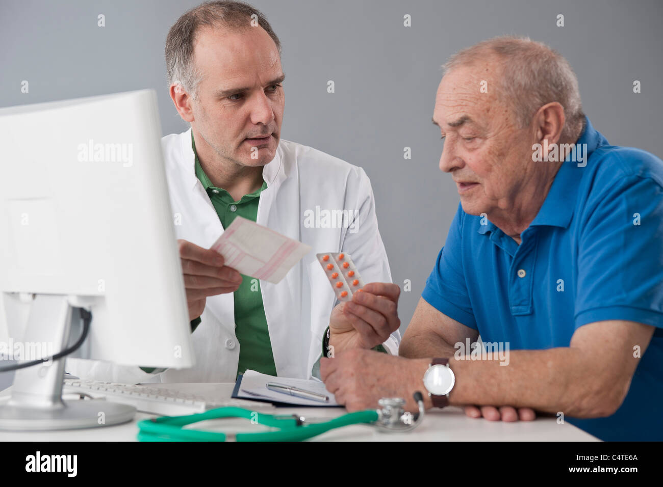 Doctor and Patient Stock Photo - Alamy
