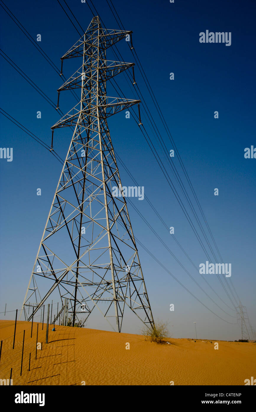 Electricity power pylon desert uae Stock Photo - Alamy
