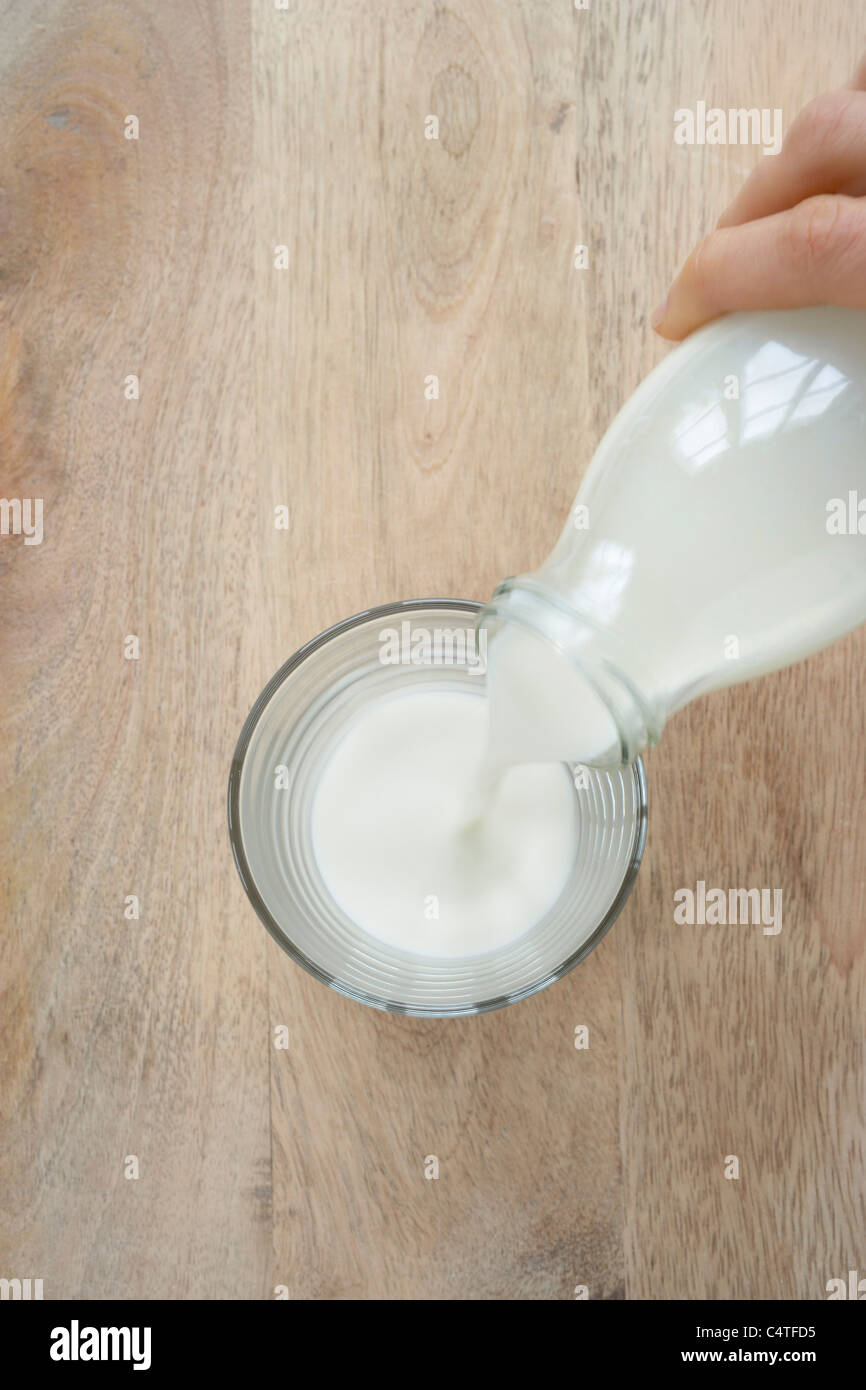 Pouring milk top angle hi-res stock photography and images - Alamy