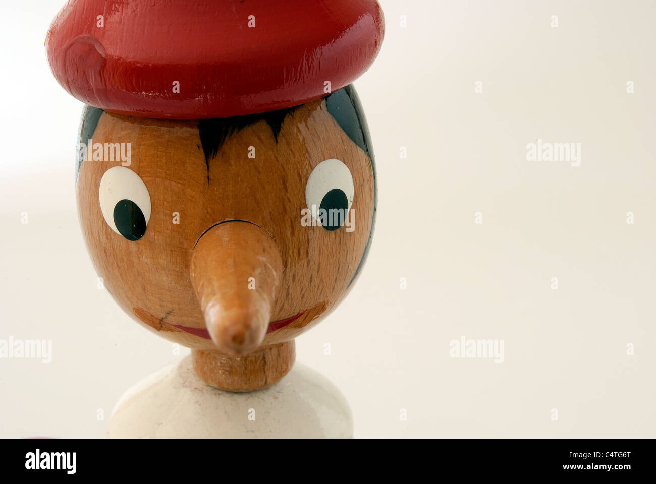 Pinocchio on white background Stock Photo - Alamy