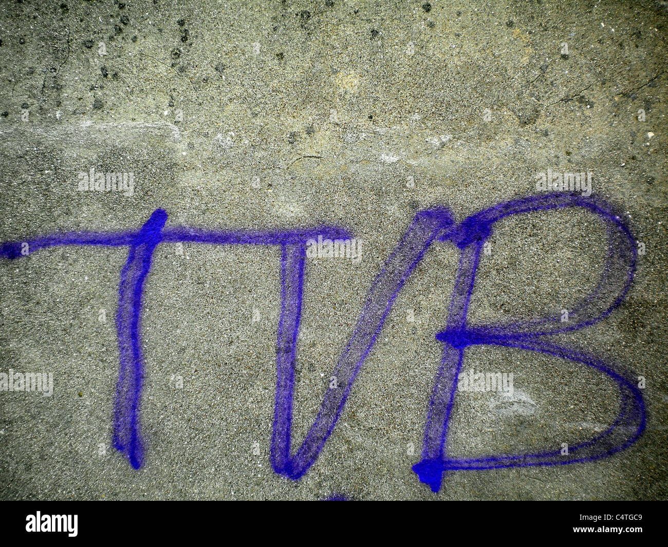 Spray graffiti on concrete walls Stock Photo - Alamy