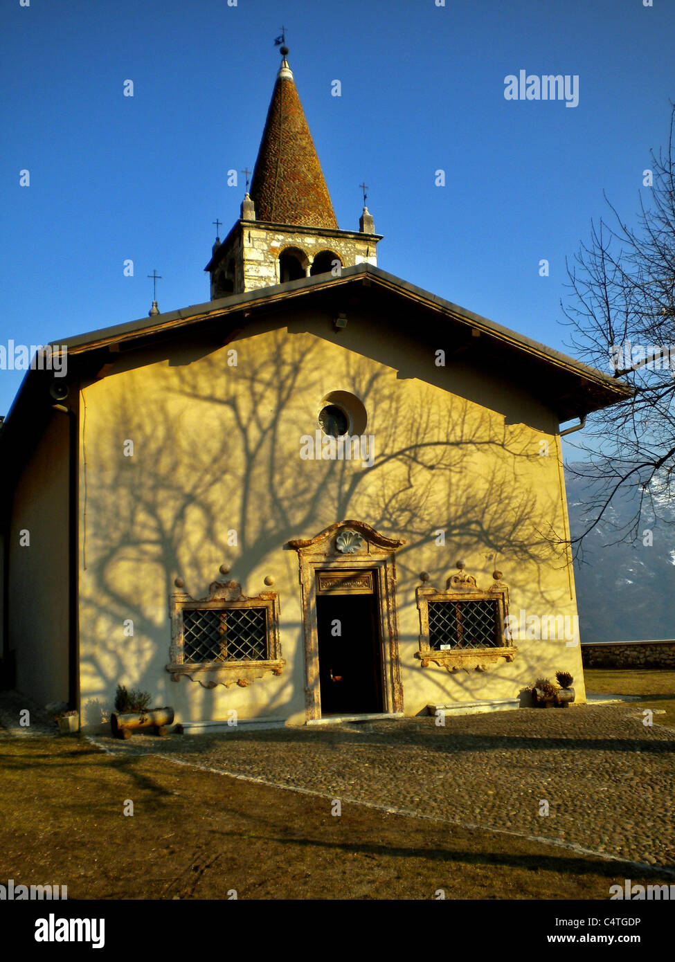 Tyrolean church with blue sky background Stock Photo - Alamy