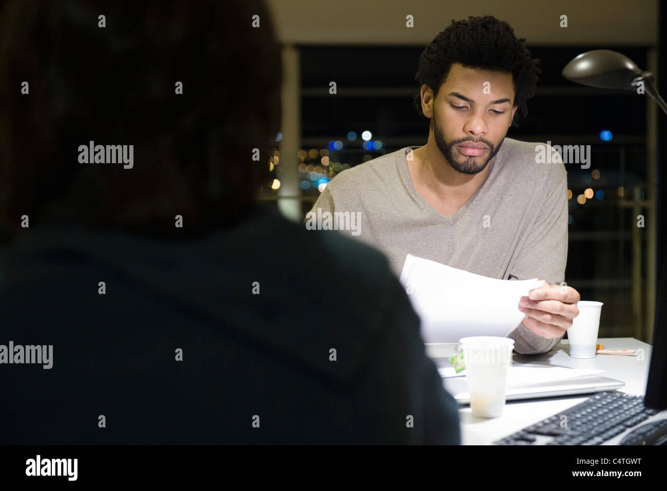 People working in office nighttime hi-res stock photography and images ...