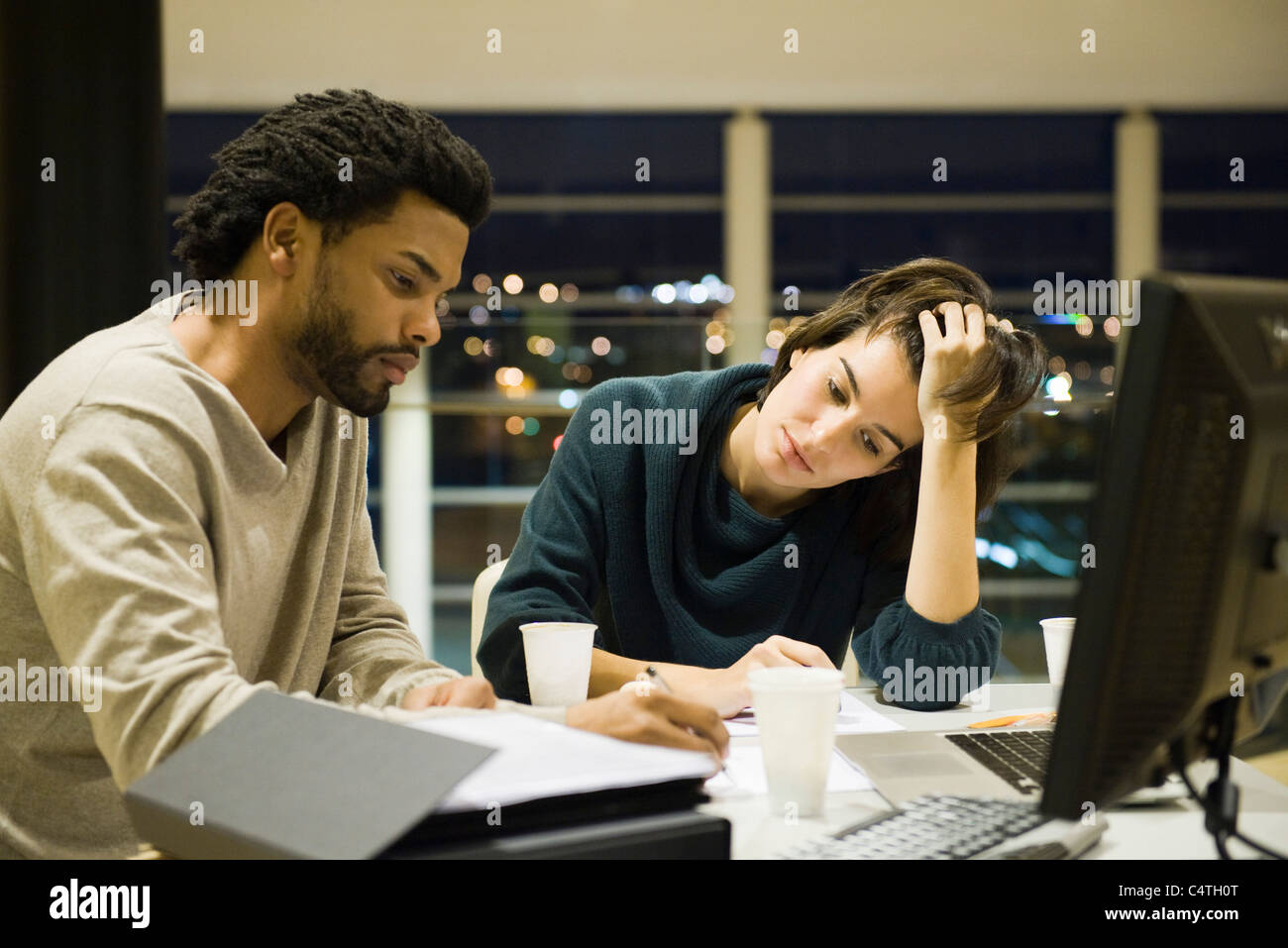 People working in office nighttime hi-res stock photography and images ...