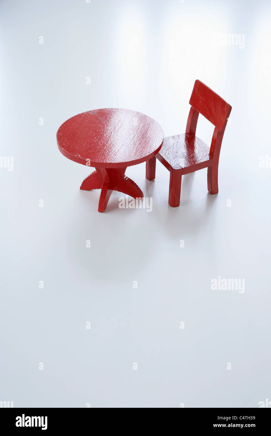 Red Table and Chair Stock Photo - Alamy
