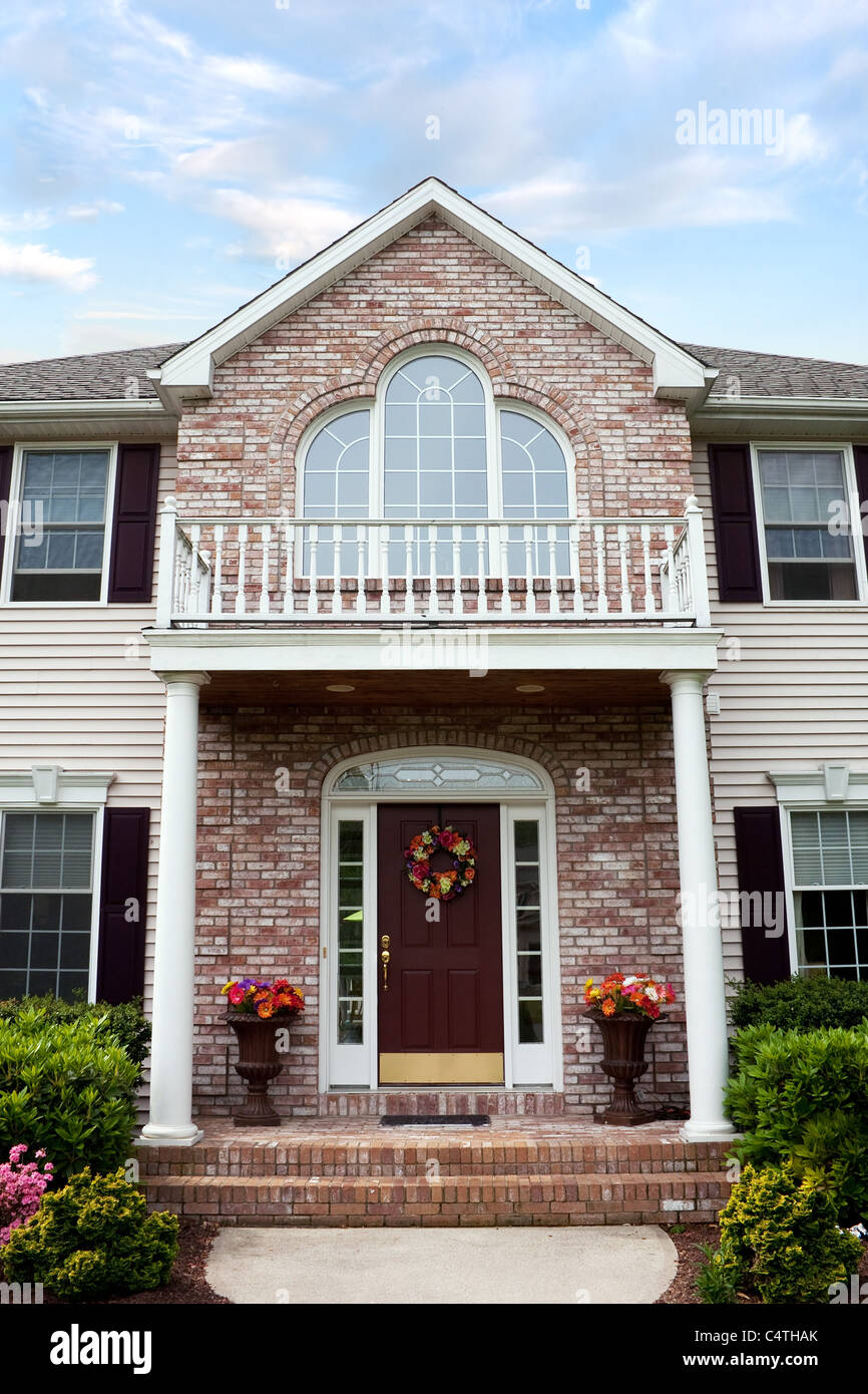A large custom built luxury home in a residential neighborhood. This ...