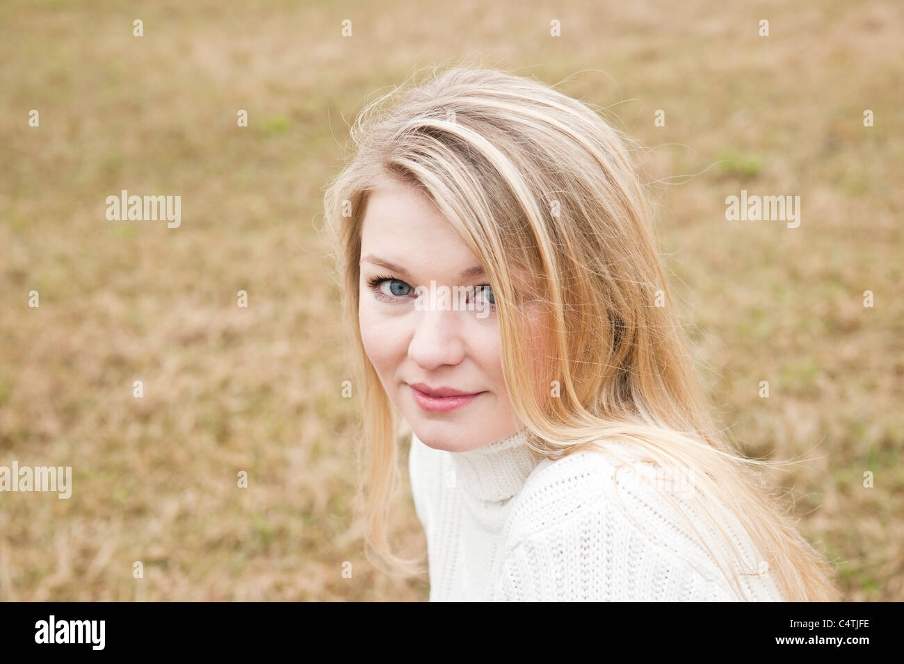 Portrait woman facing sideways hi-res stock photography and images - Alamy