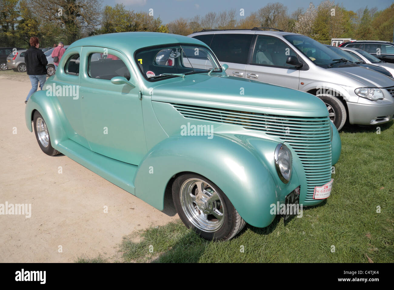 A beautiful light green coloured 1938 five window Ford coupe classic ...