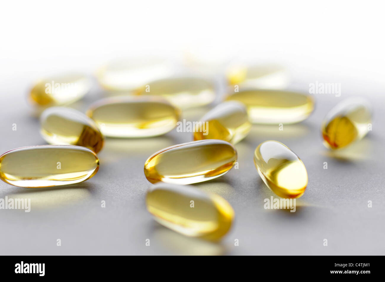 Cod liver oil capsules Stock Photo - Alamy